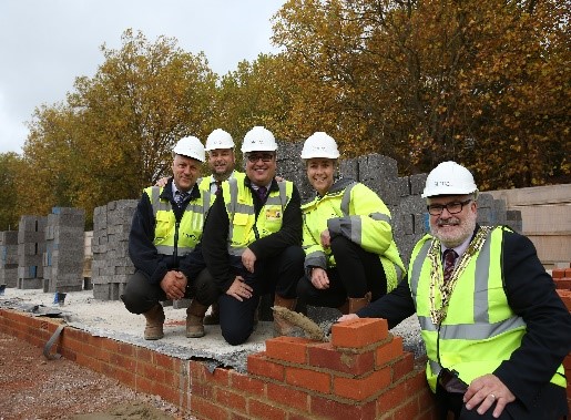 Mayor Lays Golden Brick For New Affordable Homes - Storey Homes